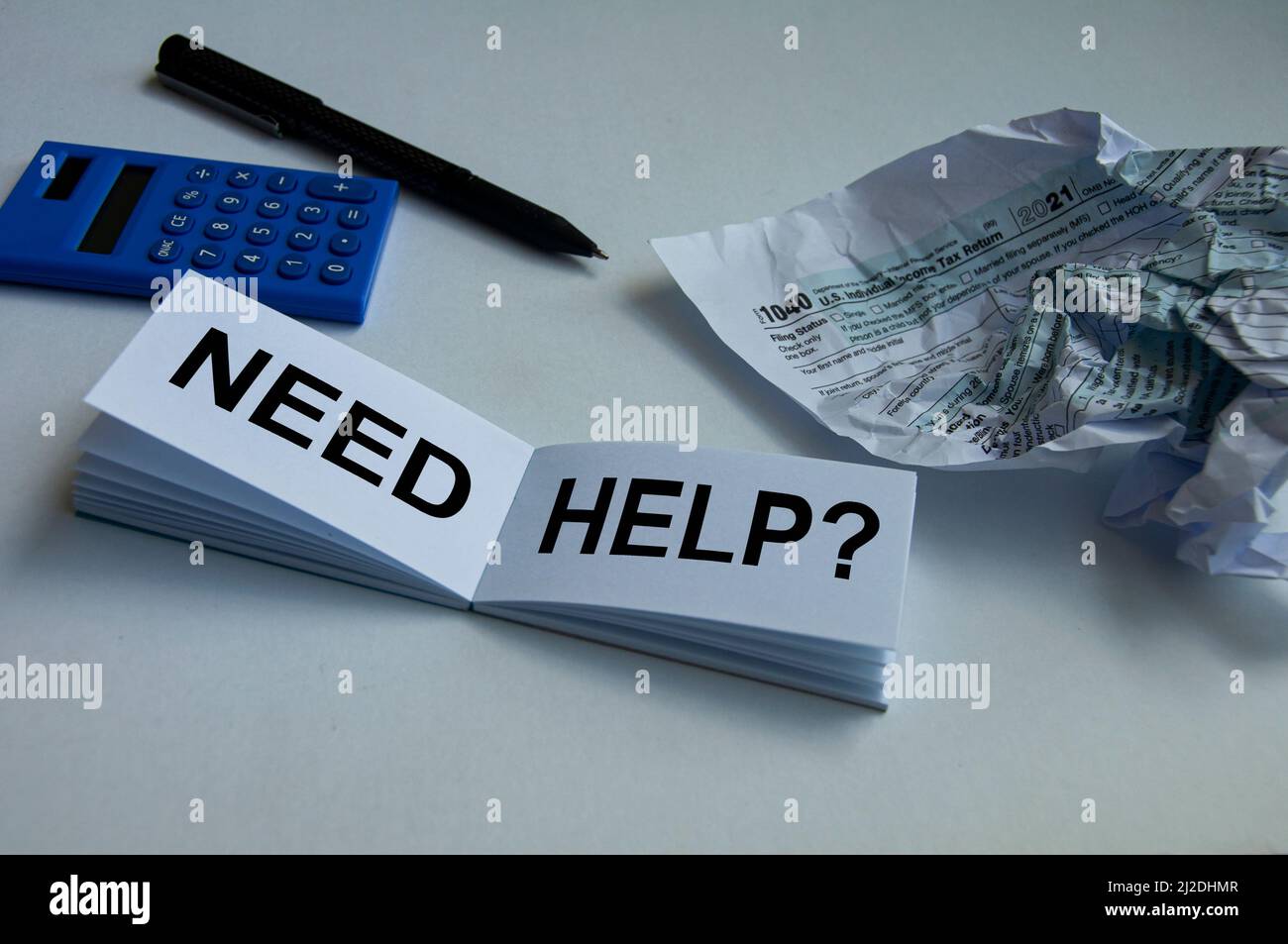 Need help text on notepad with Tax form with calculator and pen Stock ...