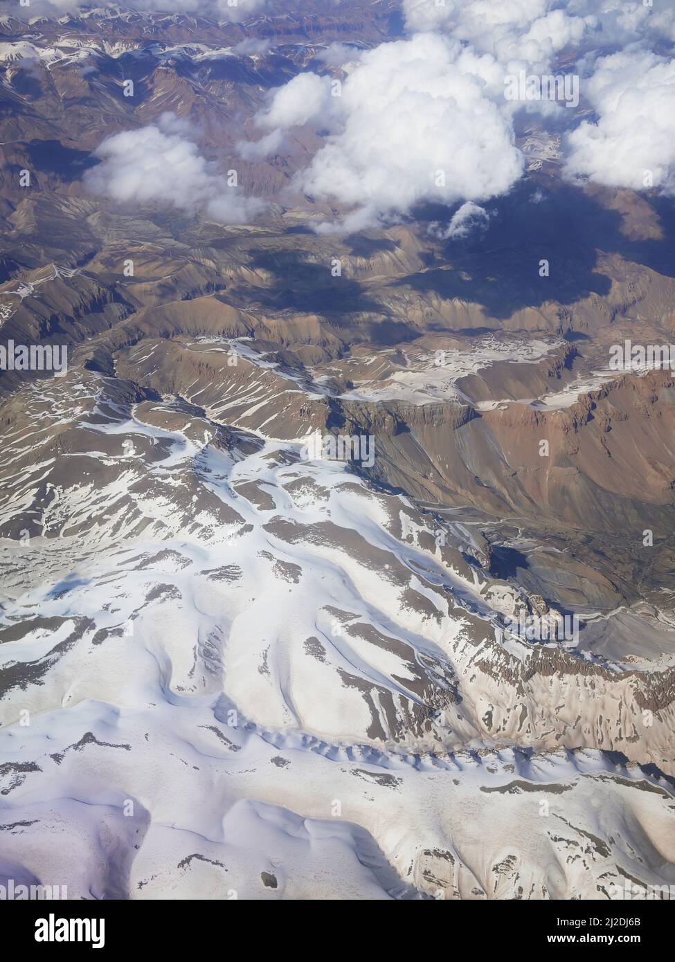 Aerial view of white snow covered mountains in winter, Snowscape ...