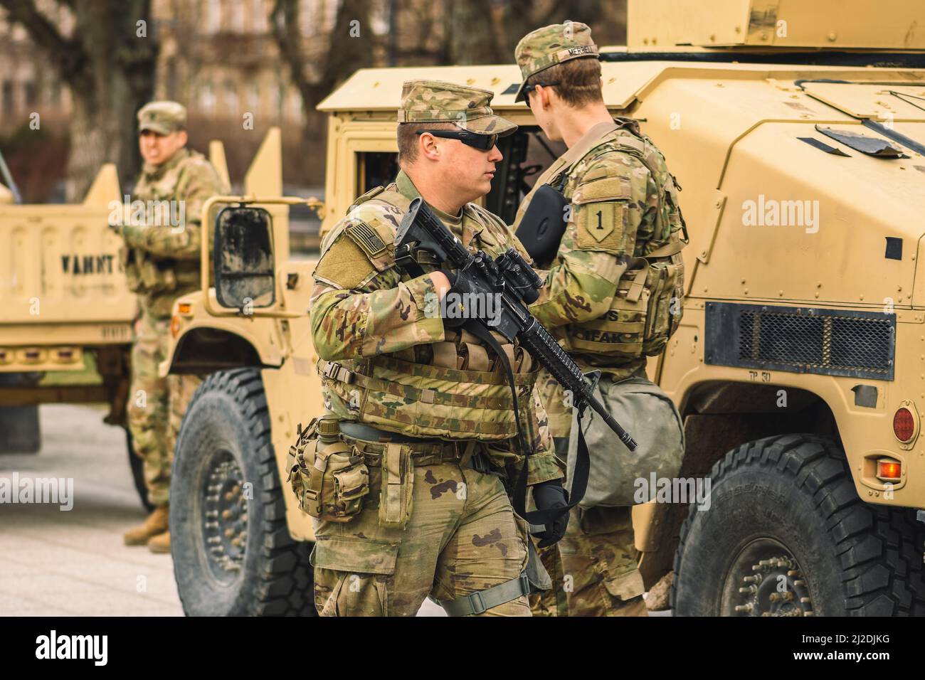 United States Marine Corps soldiers with shotguns or rifles, helmets ...