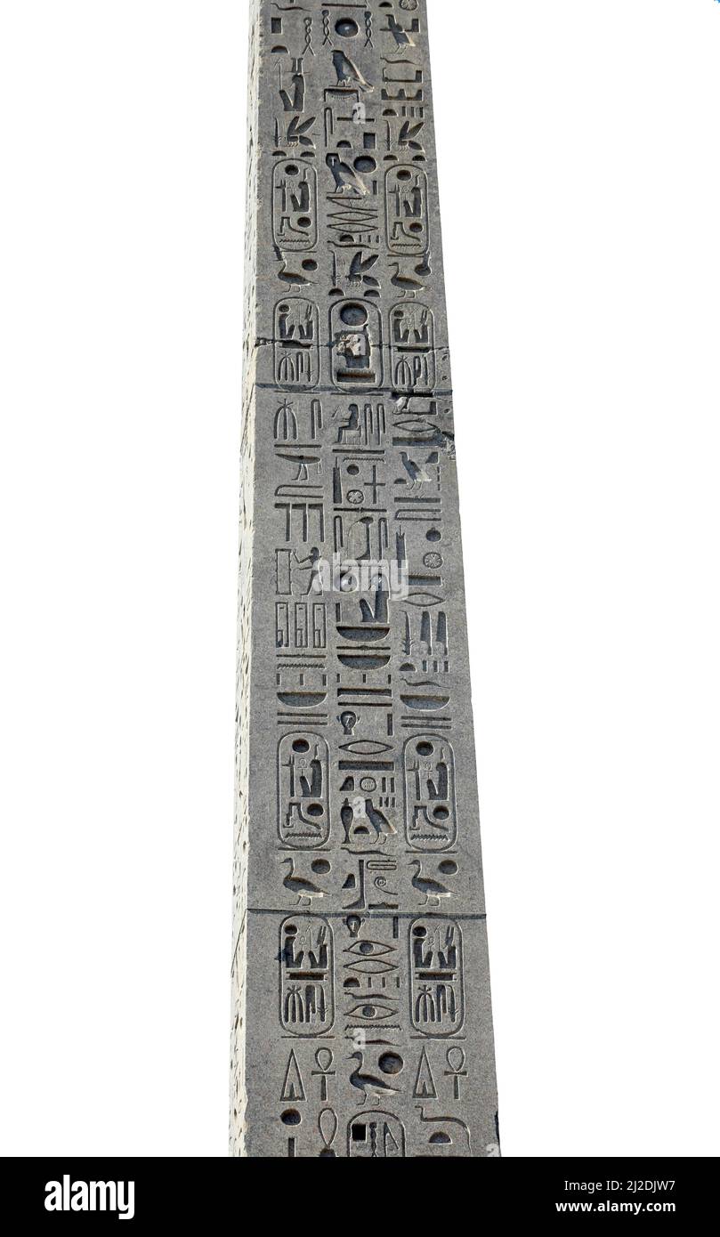 ancient Egyptian obelisk with engraved hieroglyphs on white background ...