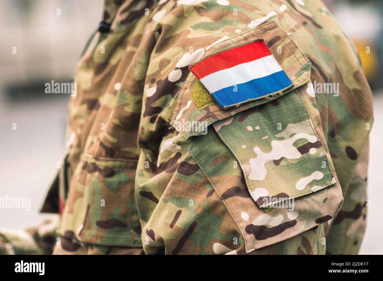 Flag of Netherlands and Royal Netherlands Army on a soldier uniform ...
