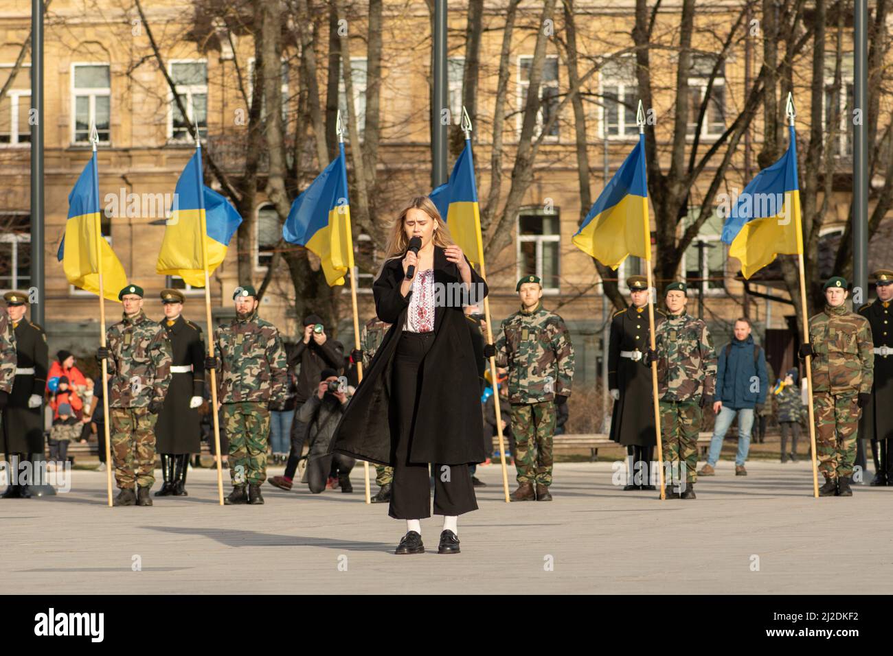 Flags of Ukraine during a ceremony in Vilnius with soldiers and ...