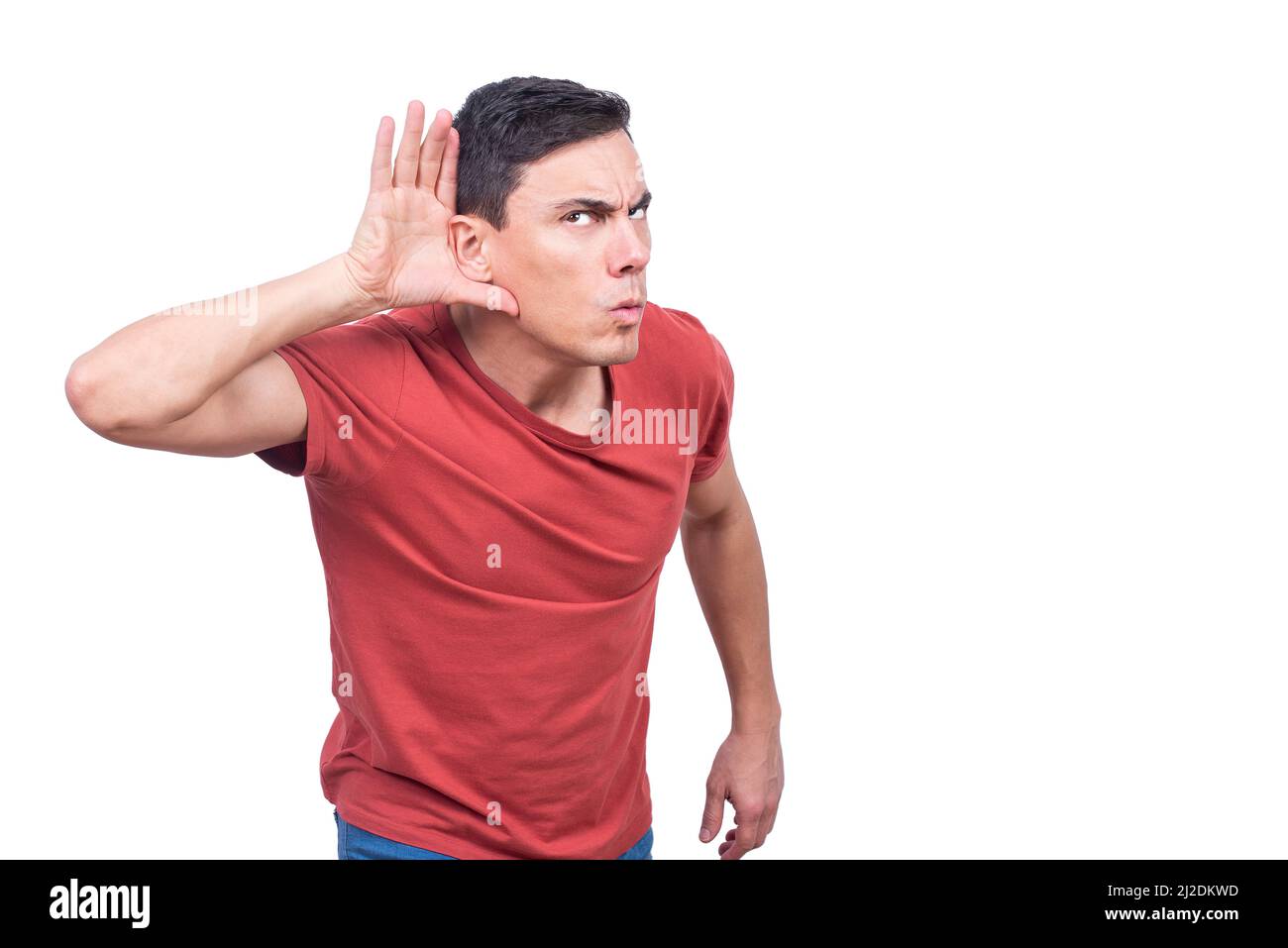 Man eavesdropping with suspicious face in light studio Stock Photo - Alamy