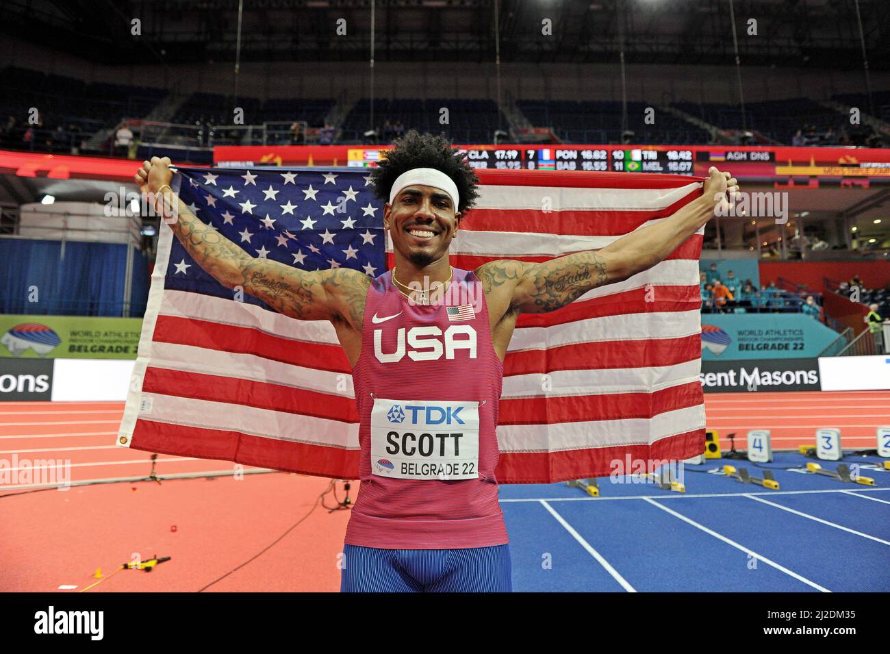Donald Scott (USA) poses with United States flag after placing third in ...