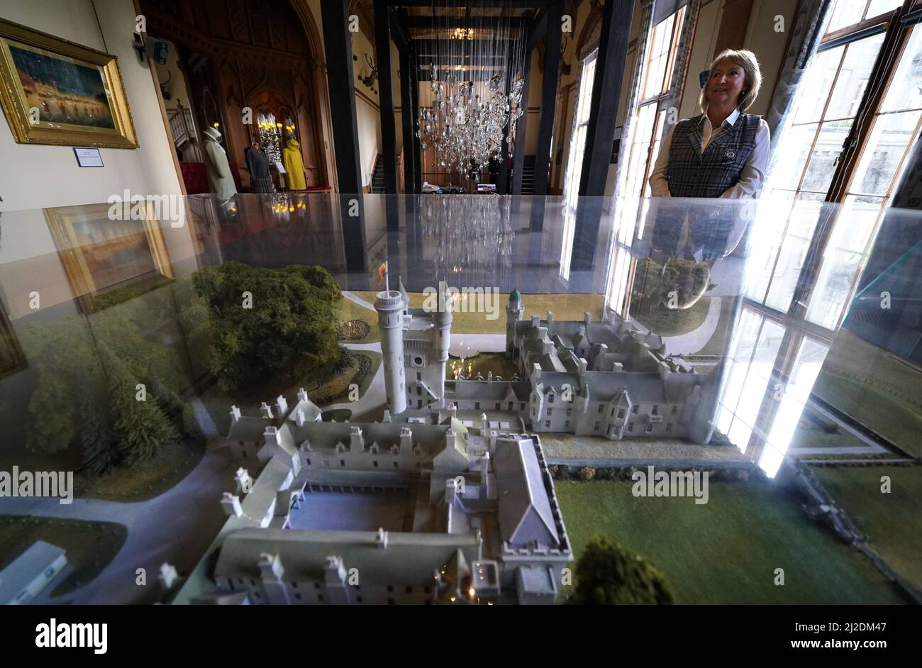 Assistant Curator Sarah Hoare views a model of Balmoral Castle, started ...