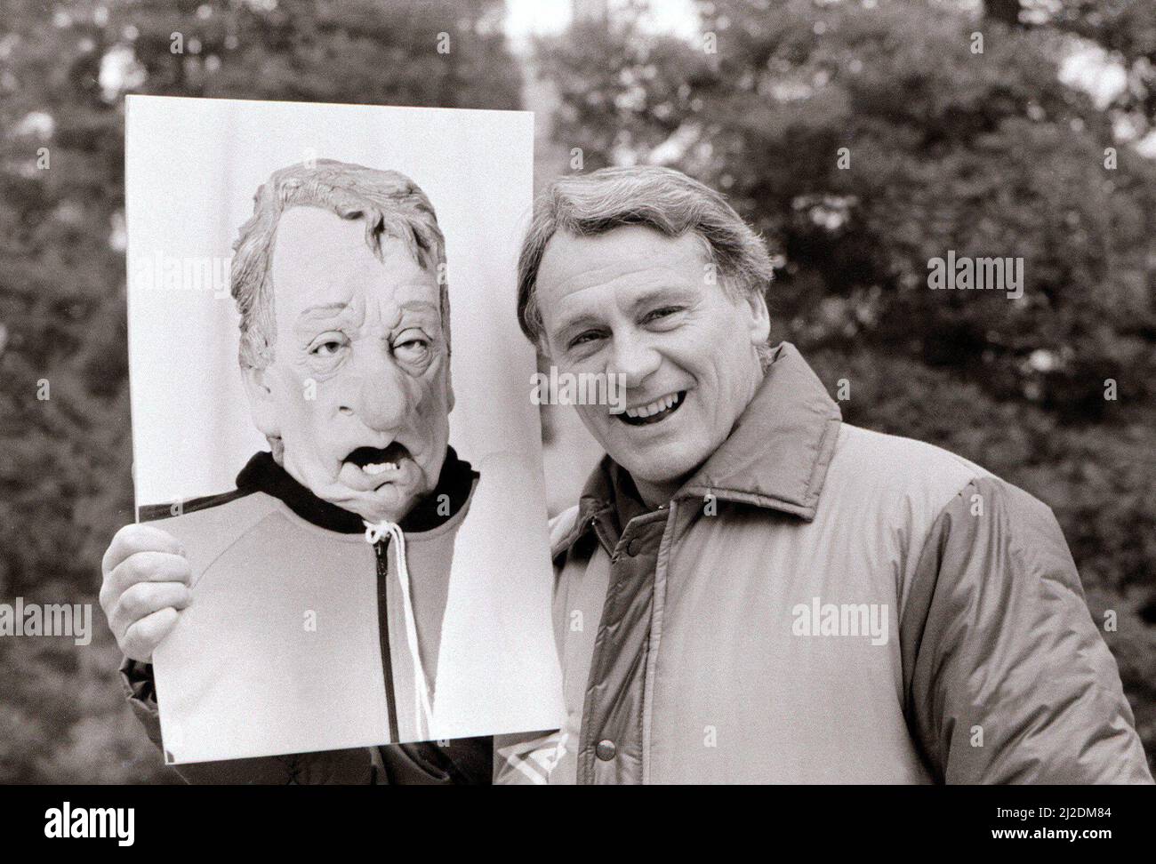 Bobby Robson England manager pictured with a photograph of his spitting ...