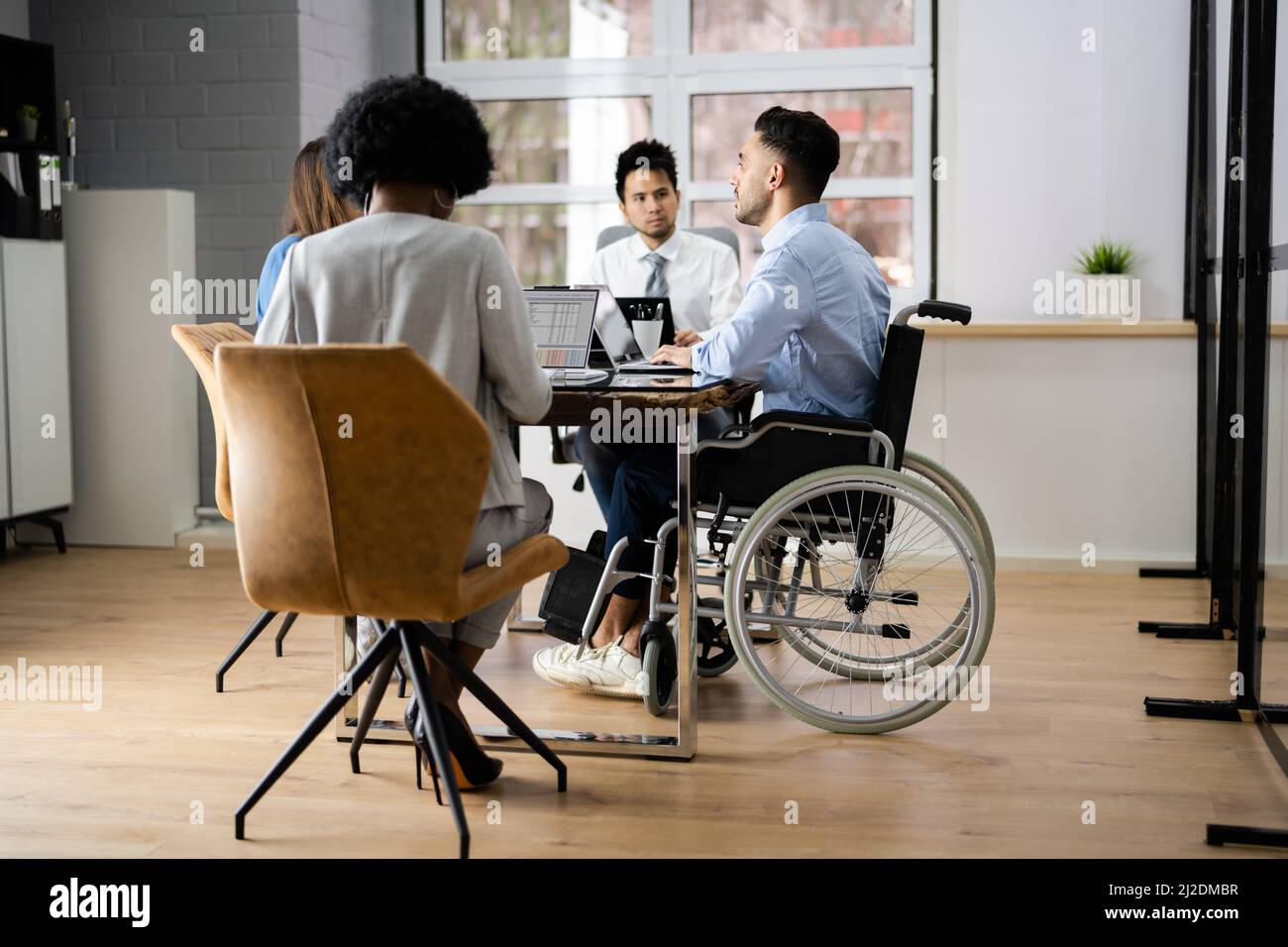 Diverse office disabled meeting hi-res stock photography and images - Alamy
