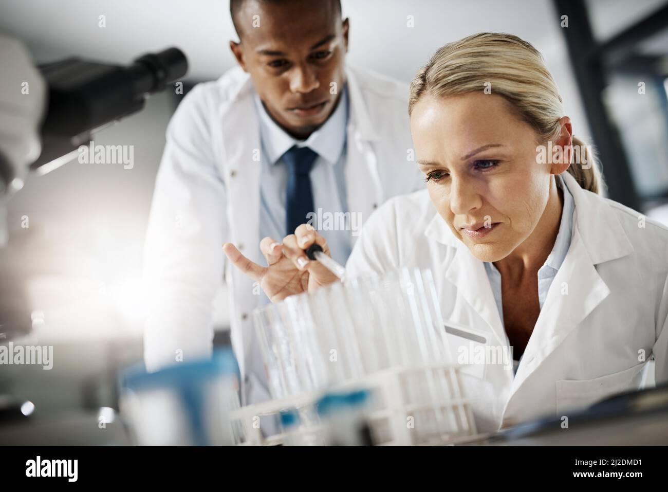 What they do saves lives. Cropped shot of two scientists testing a ...