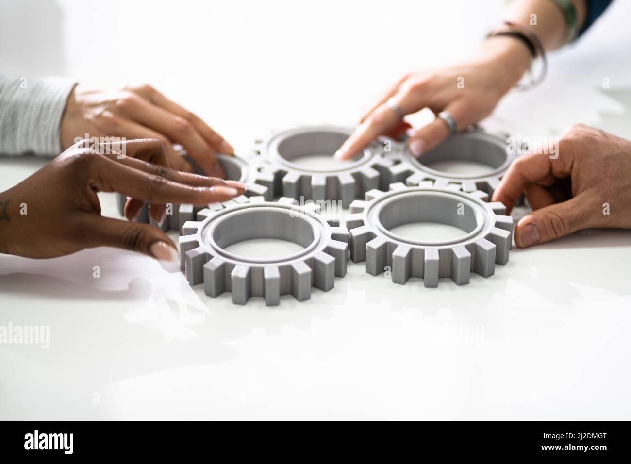 Interlocking gears hi-res stock photography and images - Alamy