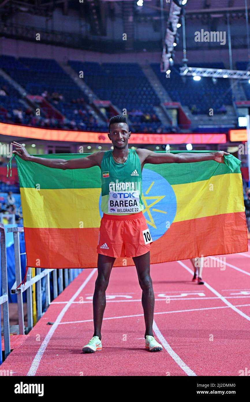 Selemon Barega (ETH) poses with Ethiopian flag after winning the 3,000m ...