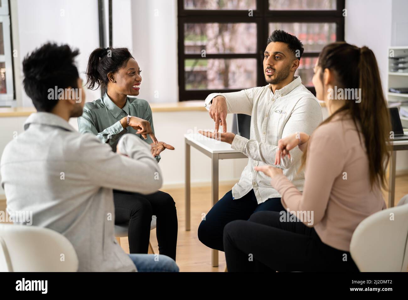 Sign Language Learning For Deaf Disabled People Stock Photo - Alamy