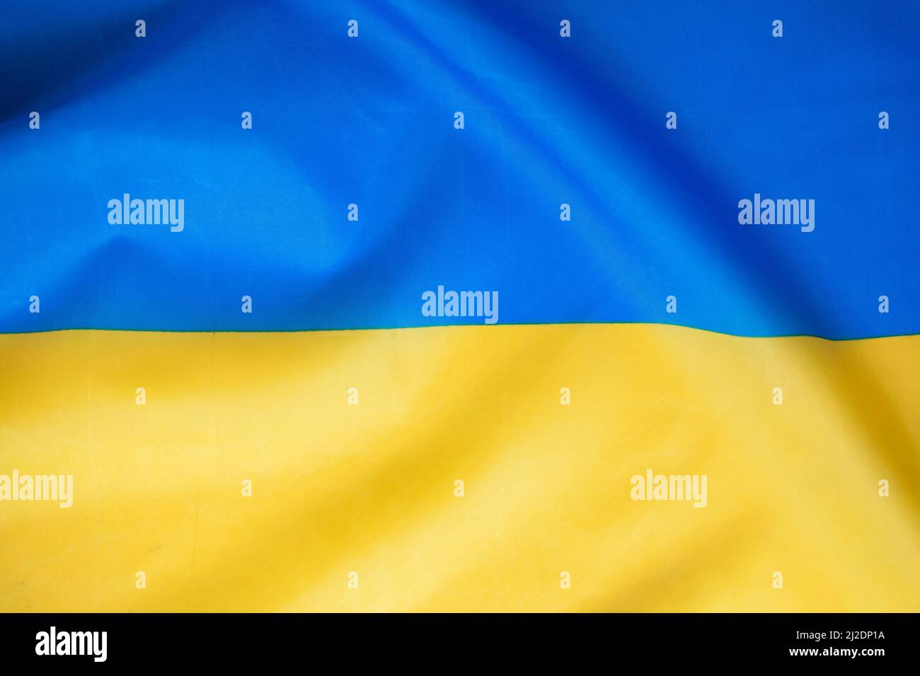 Flag of Ukraine, UA. Blue and yellow colors. Close up shot, background ...