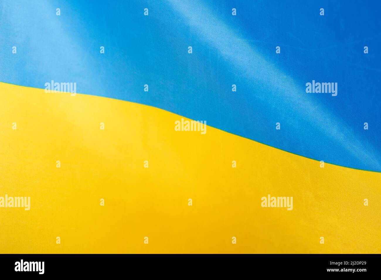 Flag of Ukraine, UA. Blue and yellow colors. Close up shot, background ...