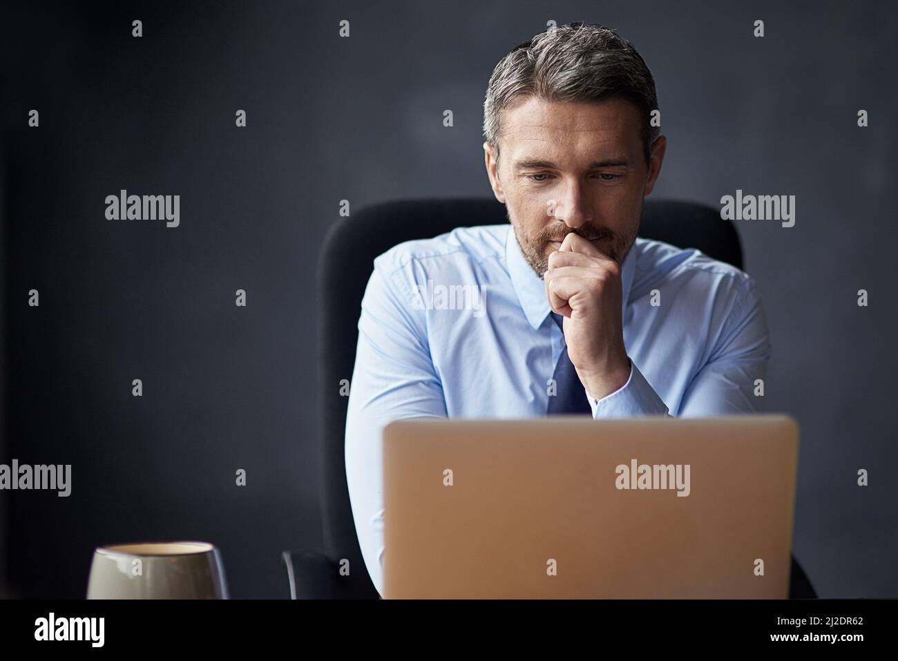 Carefully considering his next move. Cropped shot of a mature ...
