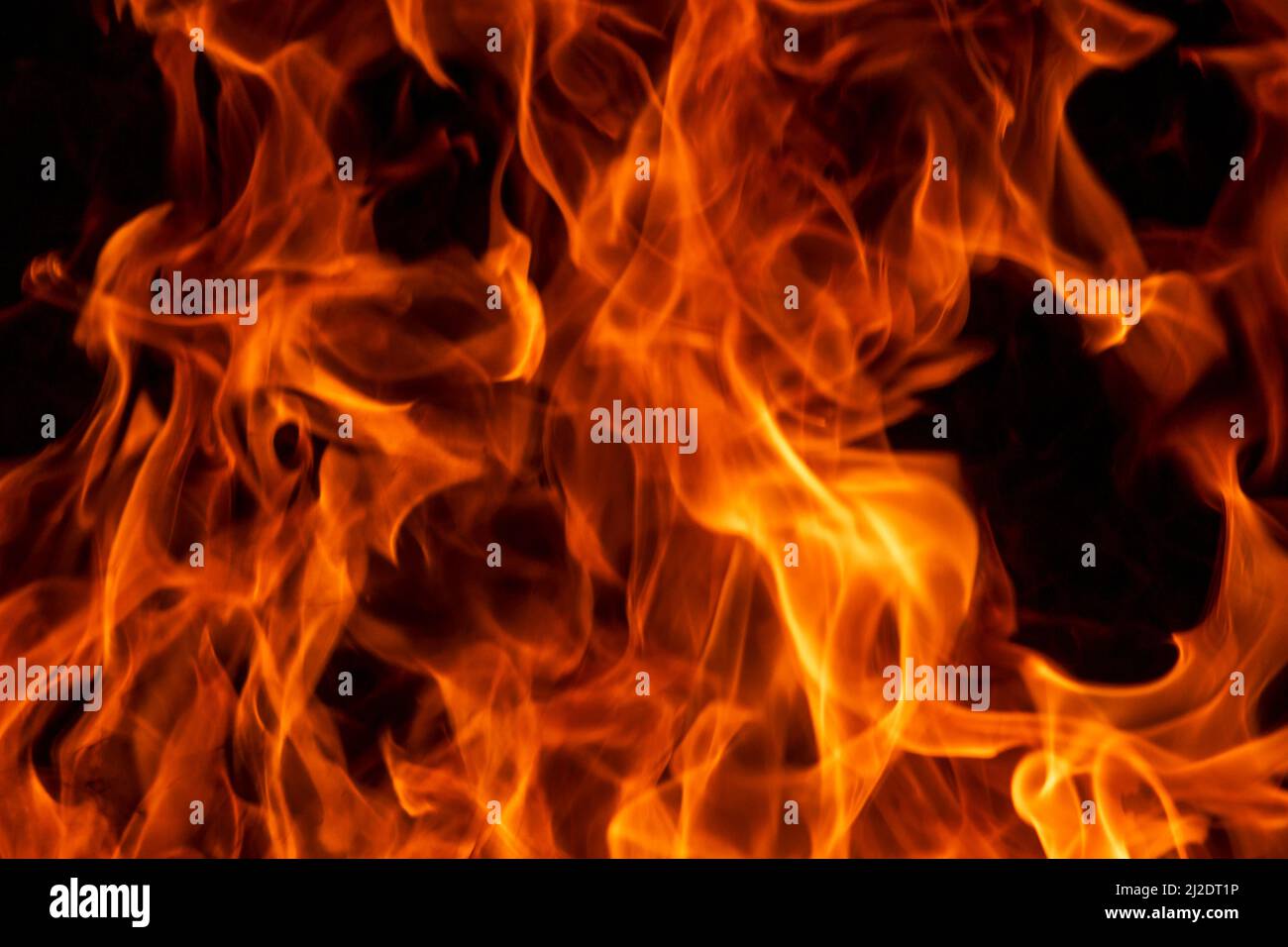 Abstract flame, fire flame texture, background. Blurred moving tongues ...