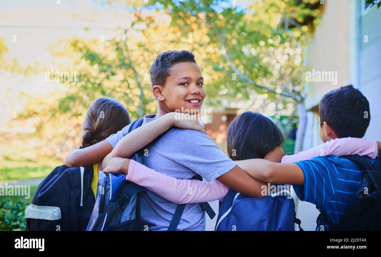 School boy walking out of school hi-res stock photography and images ...