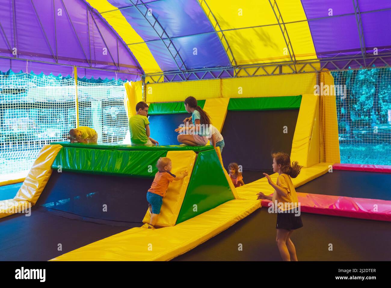 The happy child have a nice day in the trampoline park Stock Photo - Alamy