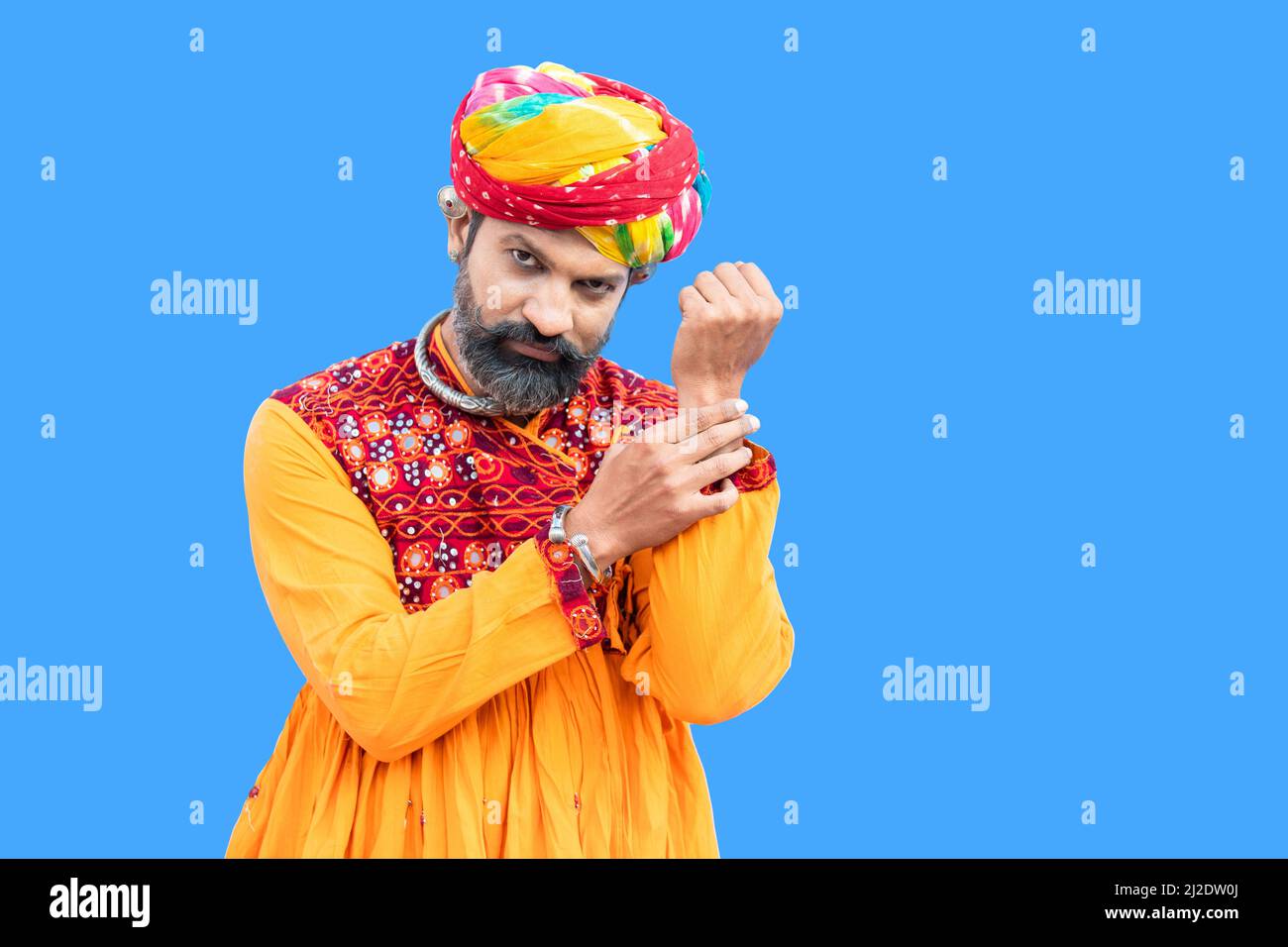 Portrait of angry beard indian rajasthan man wearing traditional ...