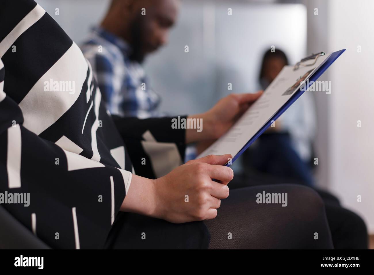 Woman hands holding resume hi-res stock photography and images - Alamy