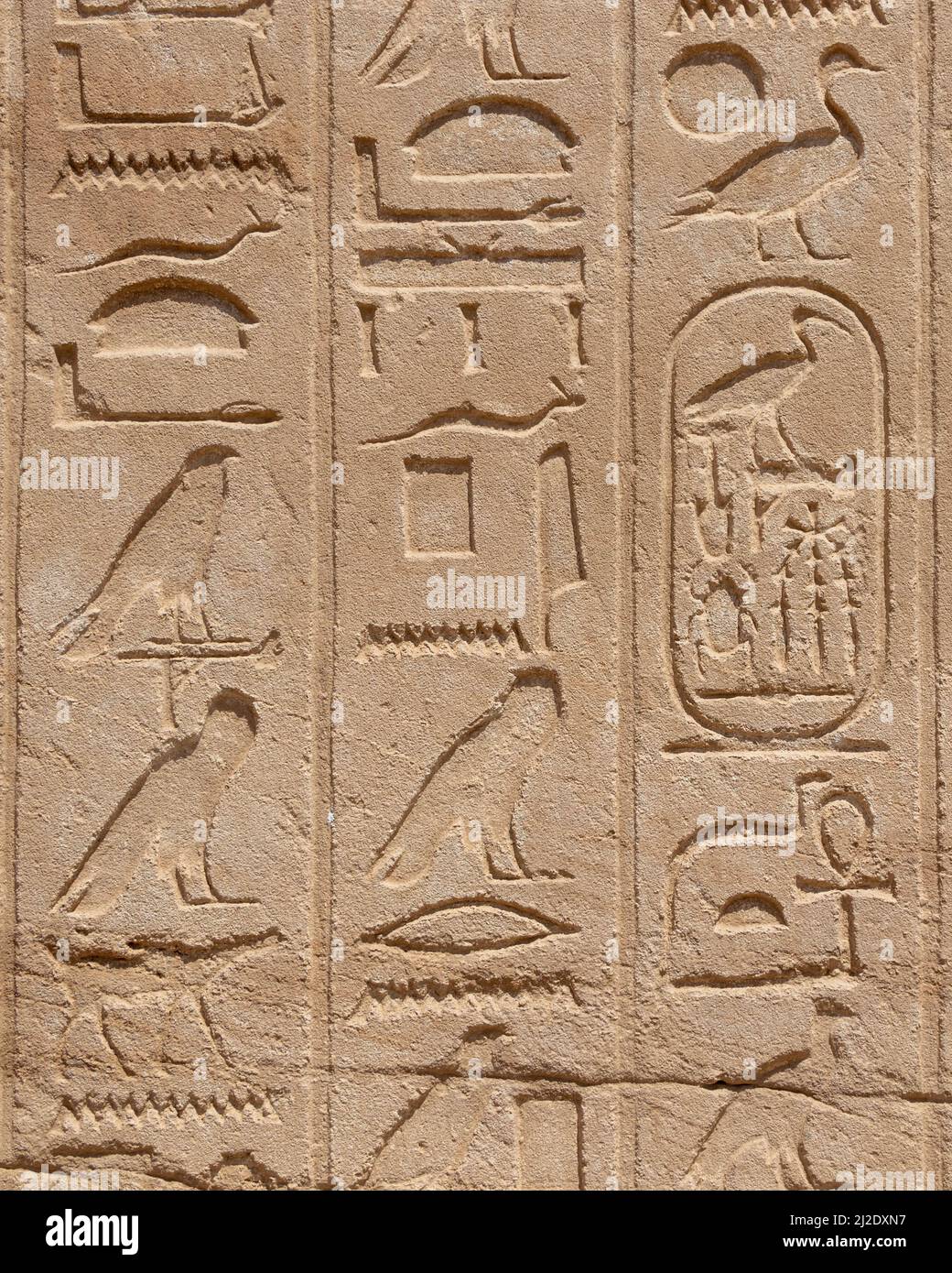 Ancient Egyptian murals and writings on the stone walls of the Karnak ...