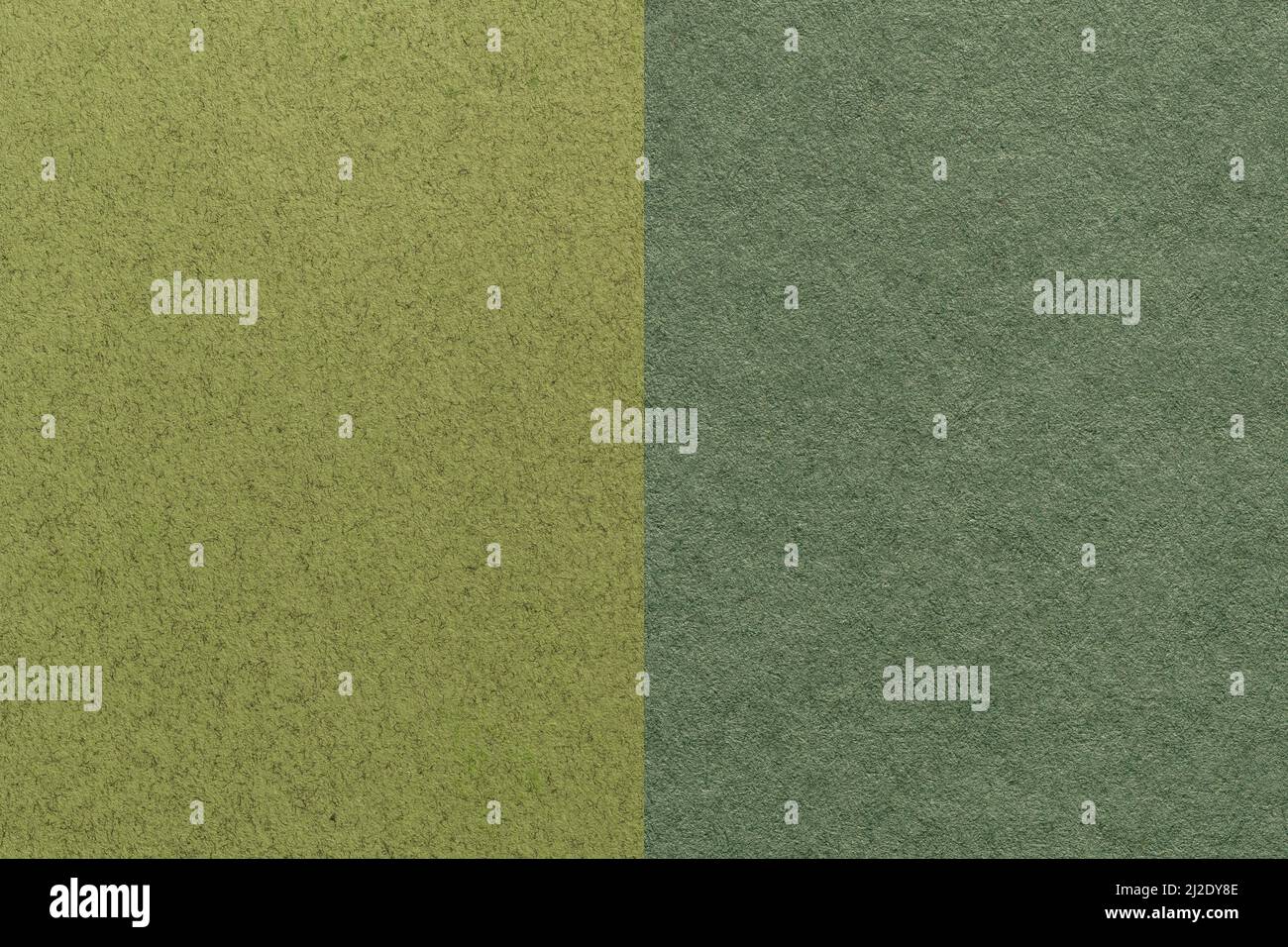 Texture of craft dark green and olive paper background, half two colors ...