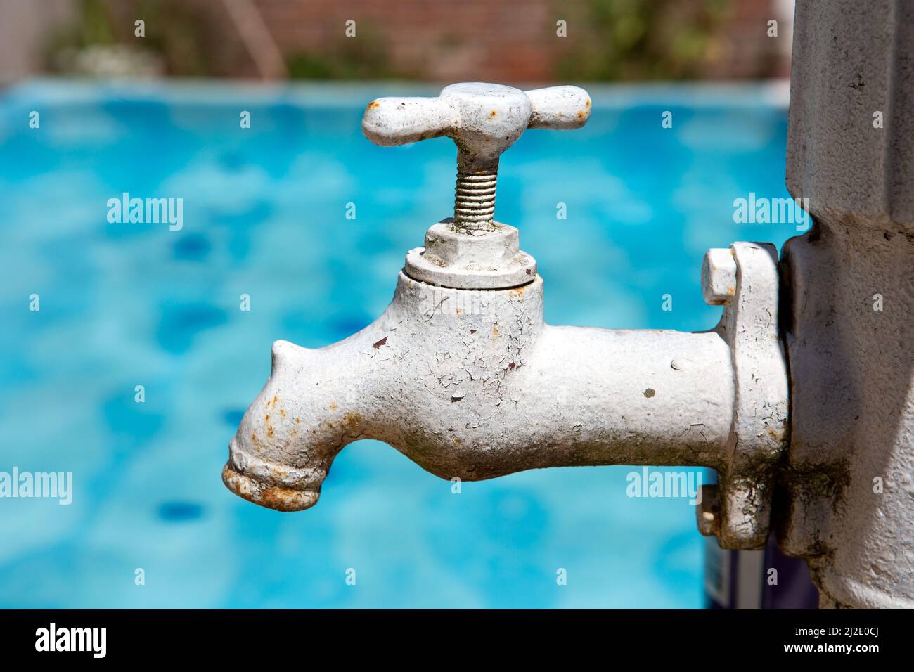 antique faucet with rust and cracked paint Stock Photo - Alamy