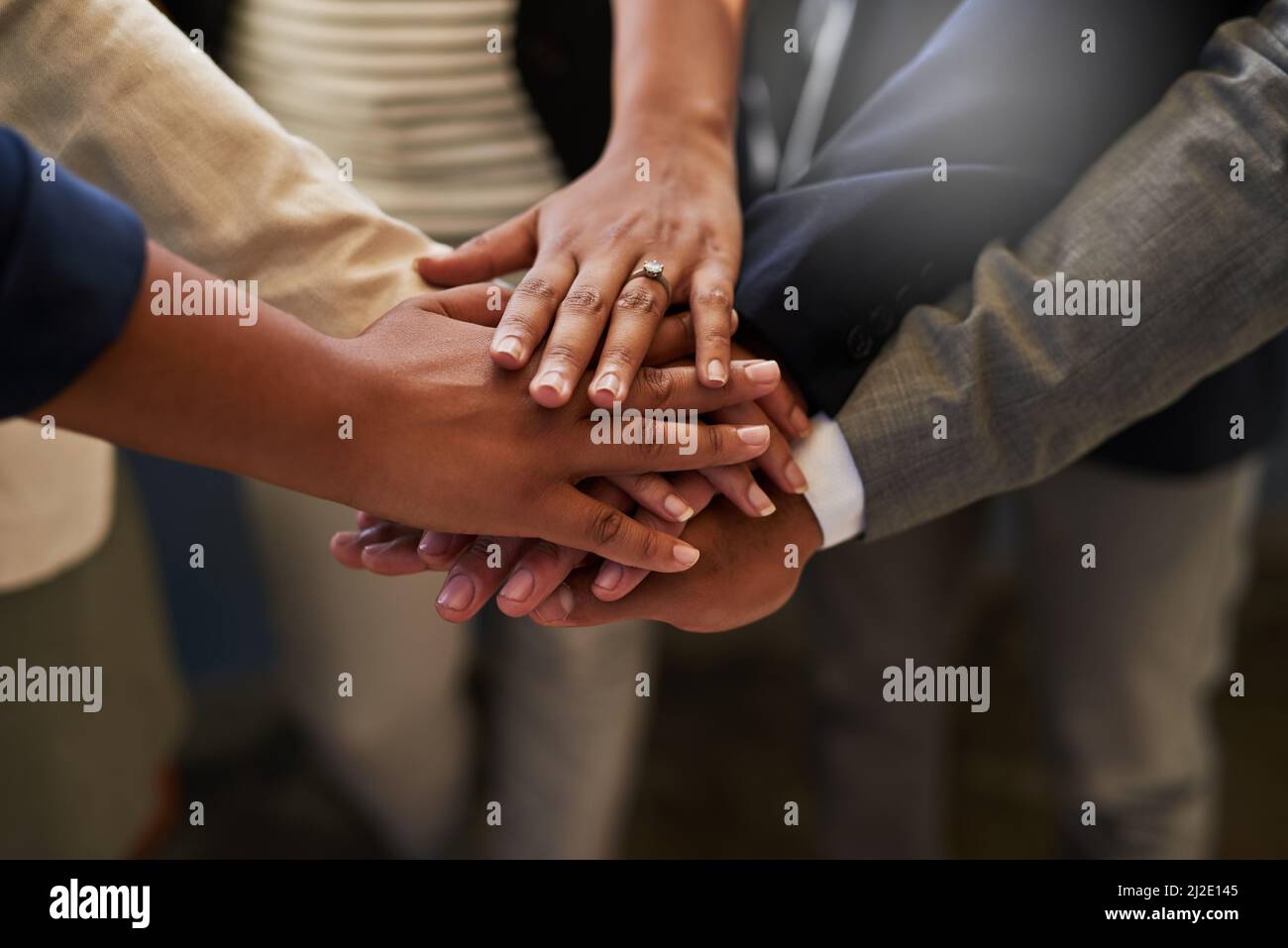 Encouraging employee motivation and inspiration as a team. Closeup shot ...