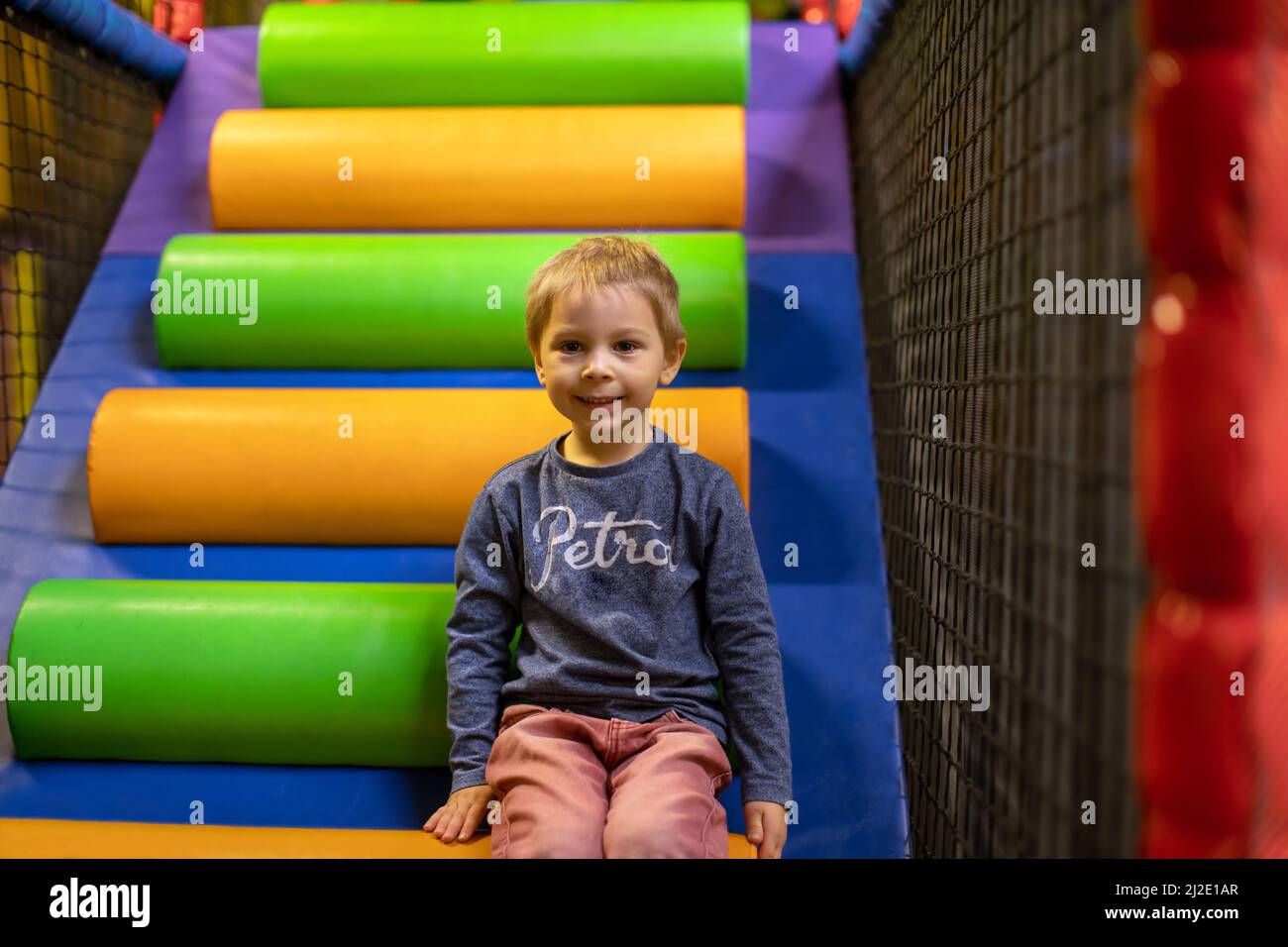 Cute child plays in play center in Prague, Czech Republic Stock Photo ...