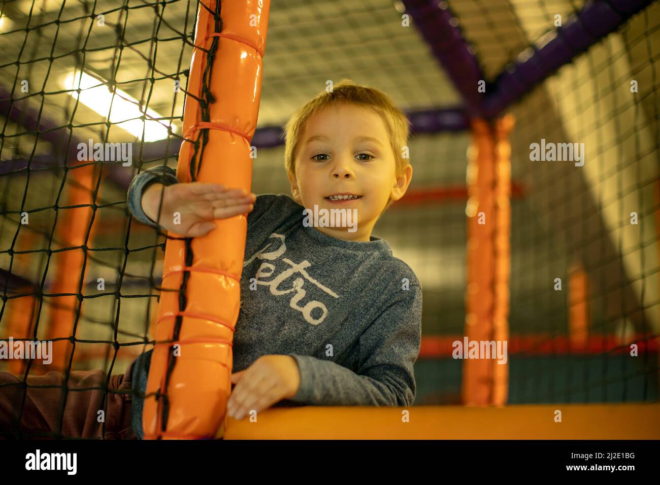 Cute child plays in play center in Prague, Czech Republic Stock Photo ...