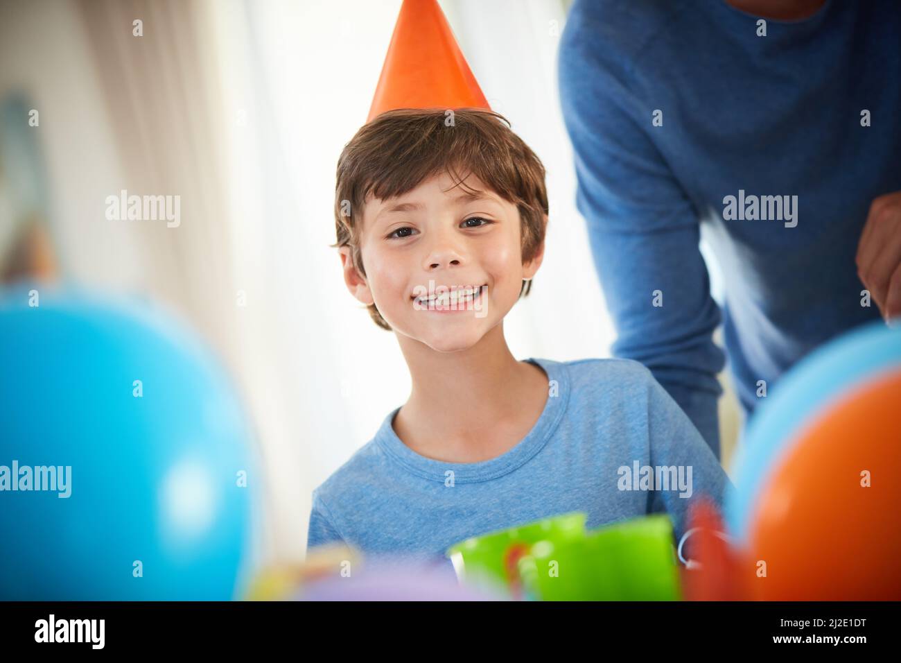 Happy birthday to me. Portrait of a happy little boy enjoying a ...