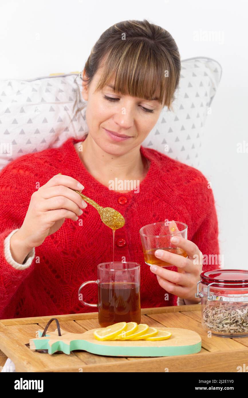 Honey lemon herbal tea Stock Photo - Alamy
