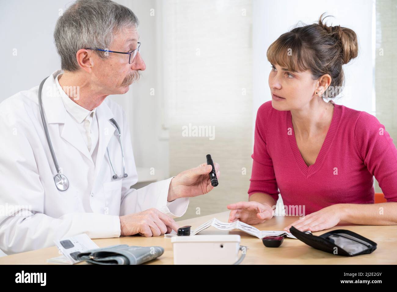 Woman diabetes test doctor hi-res stock photography and images - Alamy