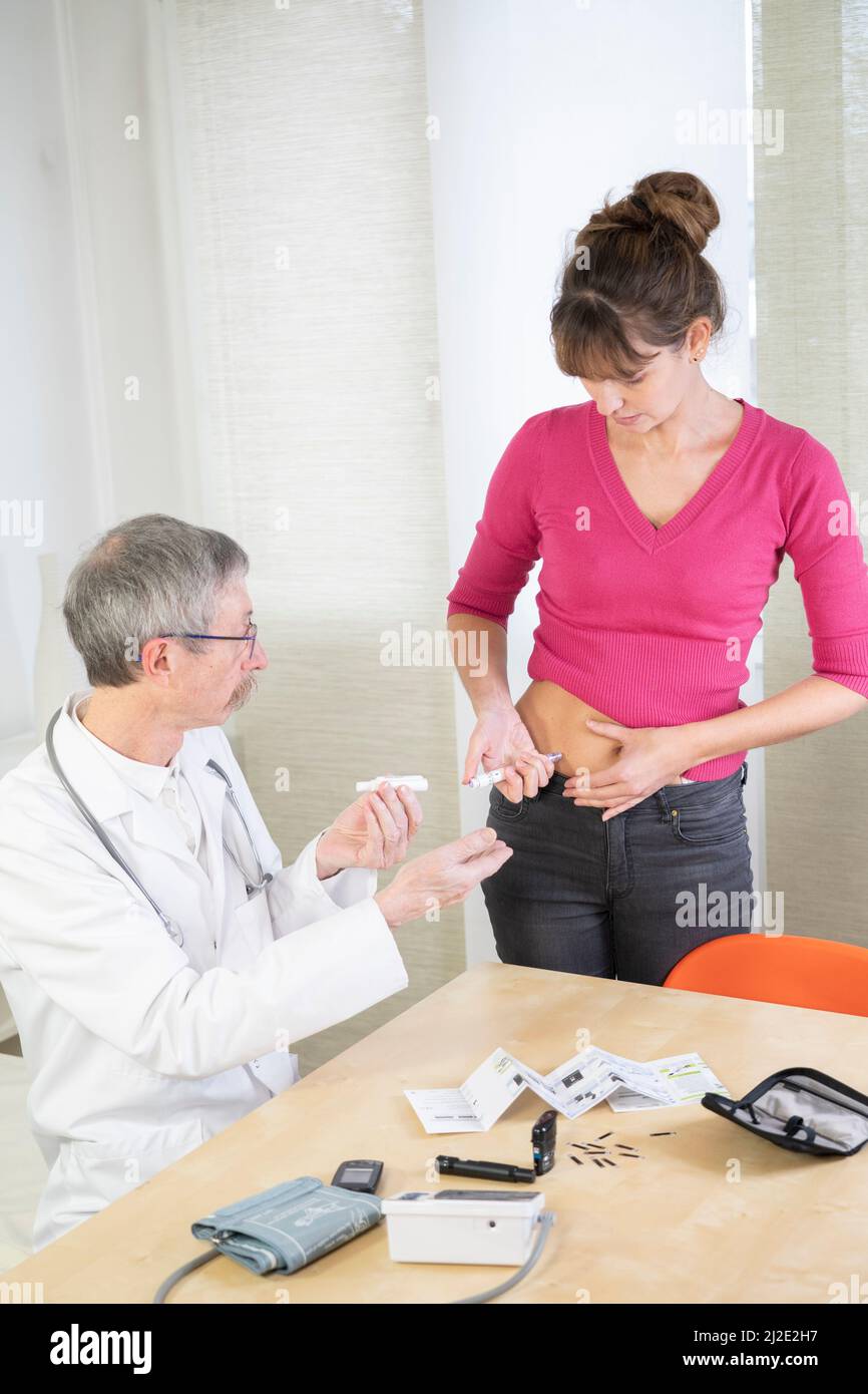 Diabetic woman with doctor Stock Photo - Alamy