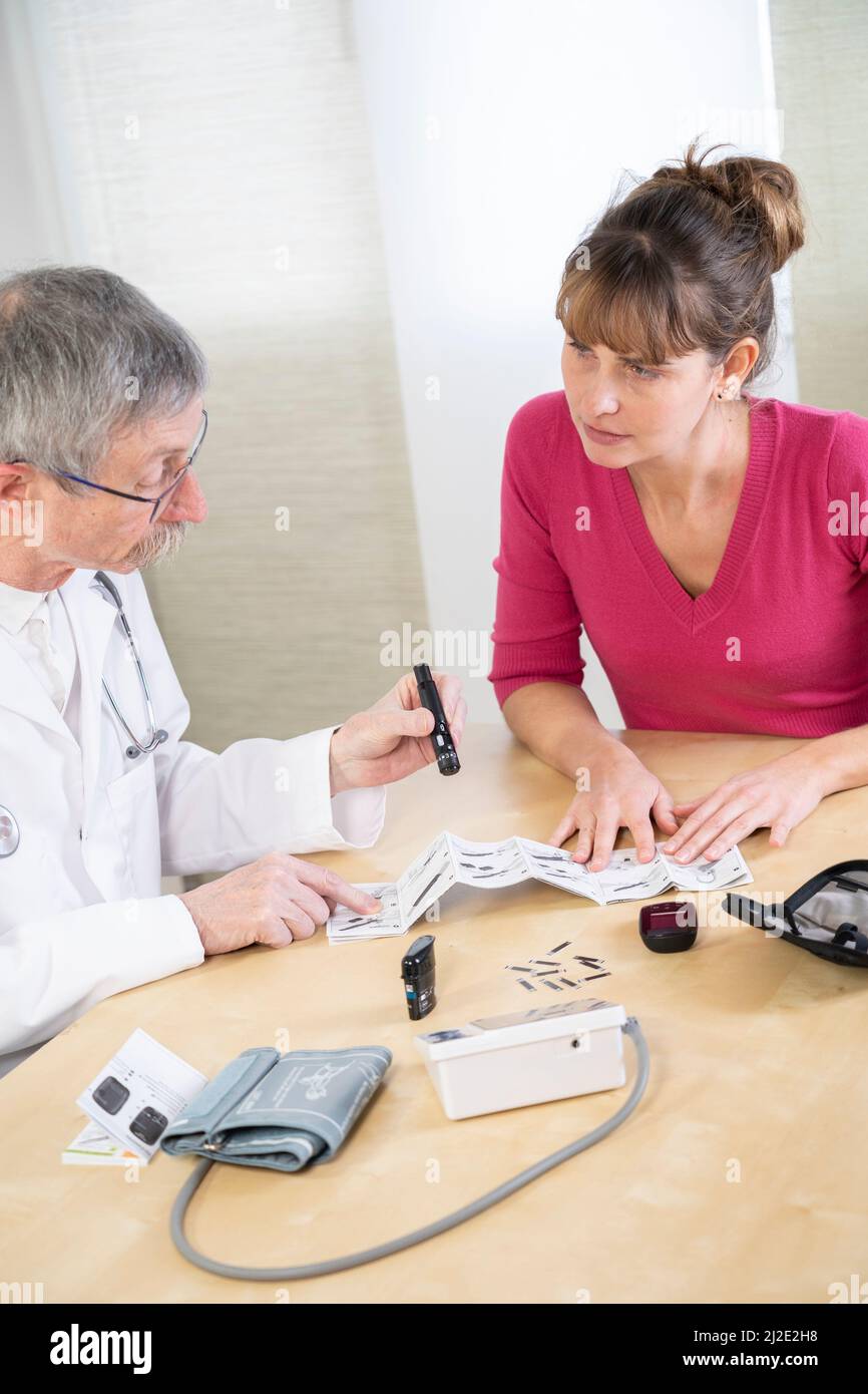 Diabetic woman with doctor Stock Photo - Alamy
