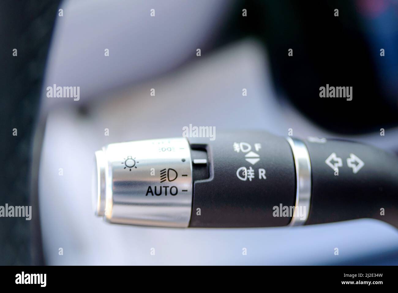 Headlight and fog-lamp controlling stick in car. The switch of light of ...