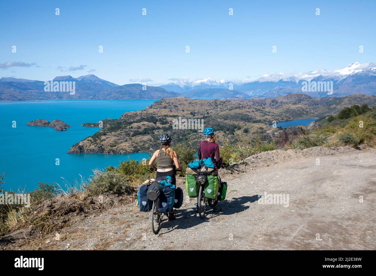 Chile 42-2020 - Two german tourists on a bike are riding the Carretera Austral route and passing ...