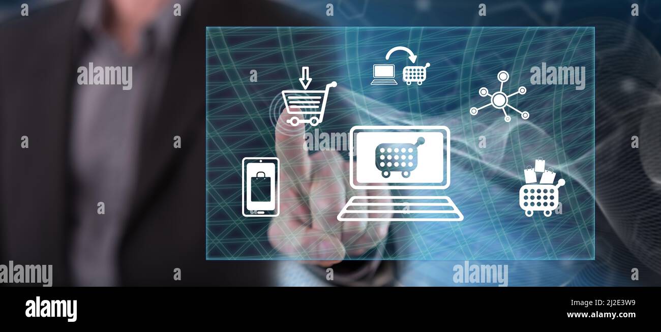 Man touching an online shopping concept on a touch screen with his ...