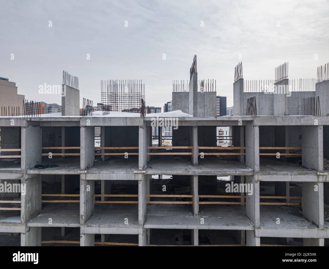 Multi-storey unfinished building. The construction of apartment ...