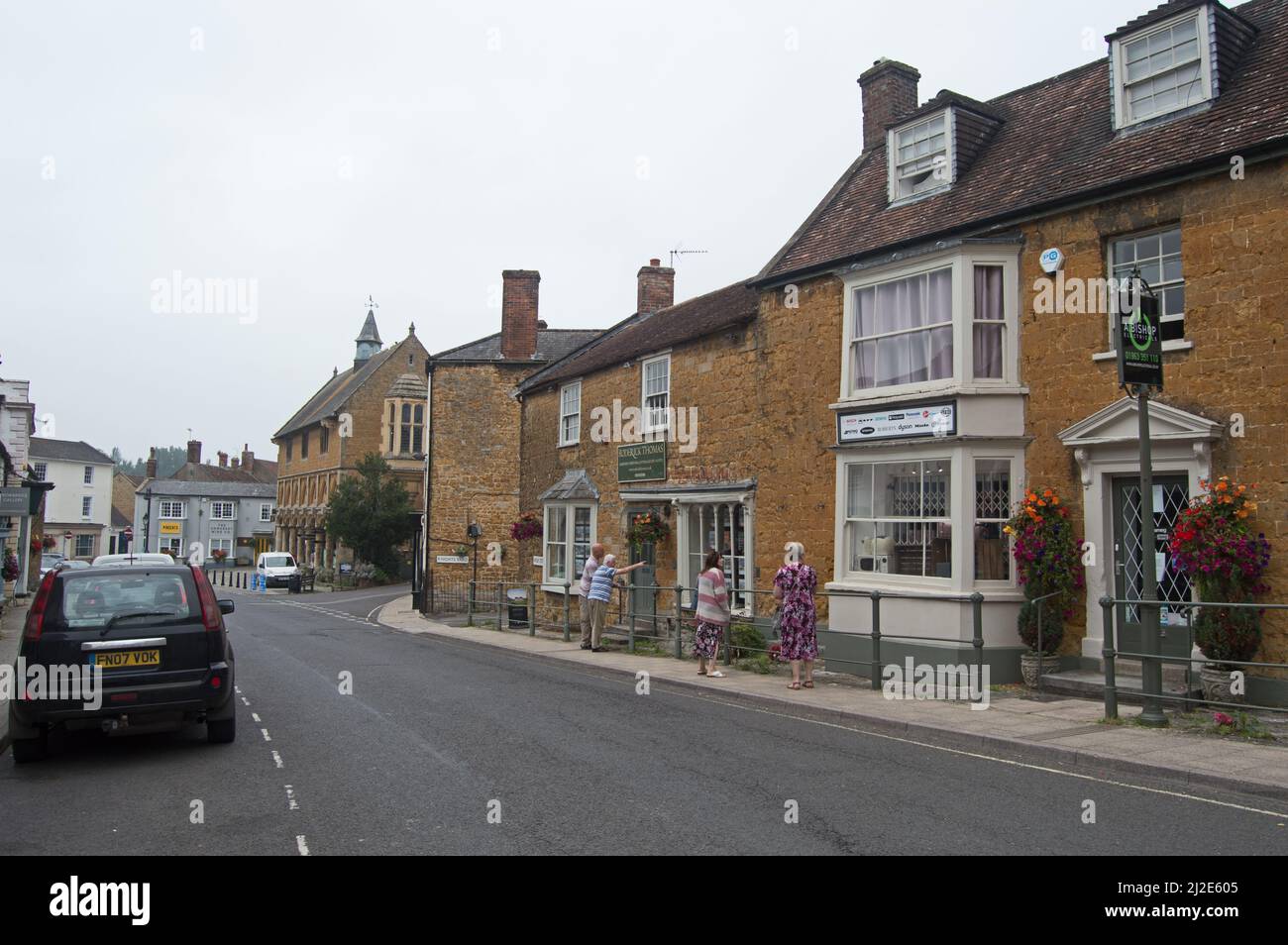 Shops and buildings on High Street, Castle Cary, Somerset, England, UK ...