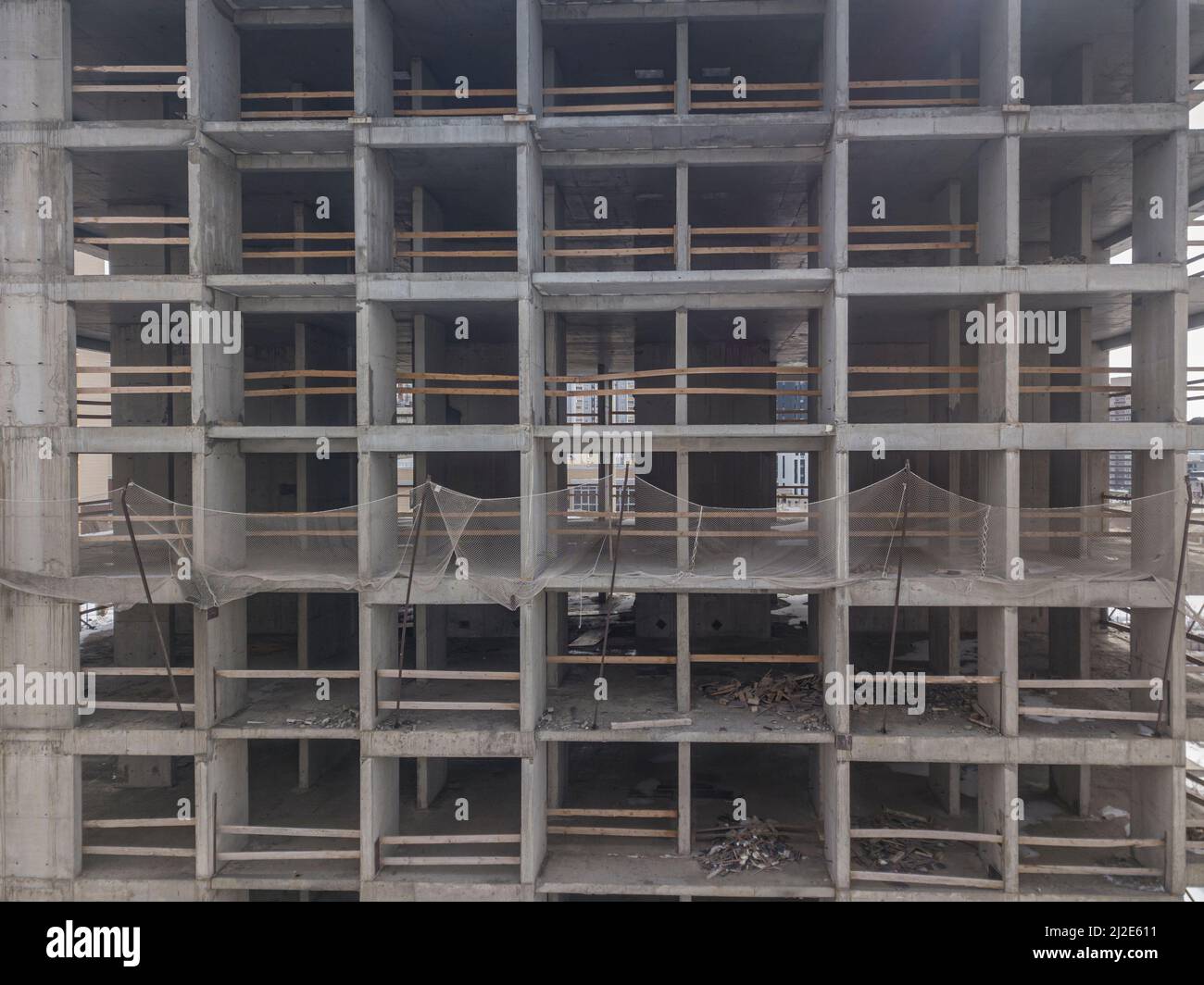 Multi-storey unfinished building. The construction of apartment ...