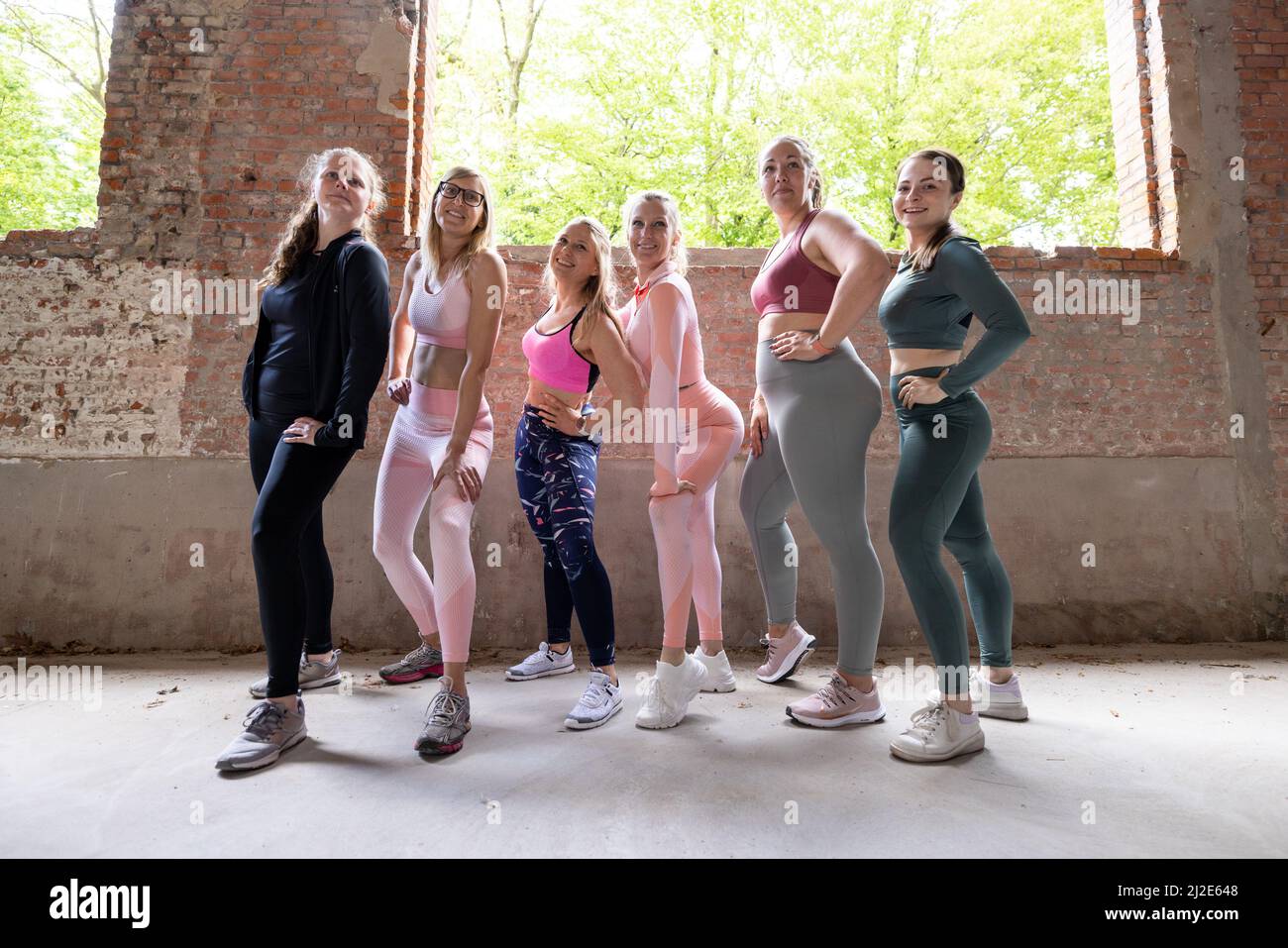 selfie group of female sport team. sporty women wearing sports clothing ...