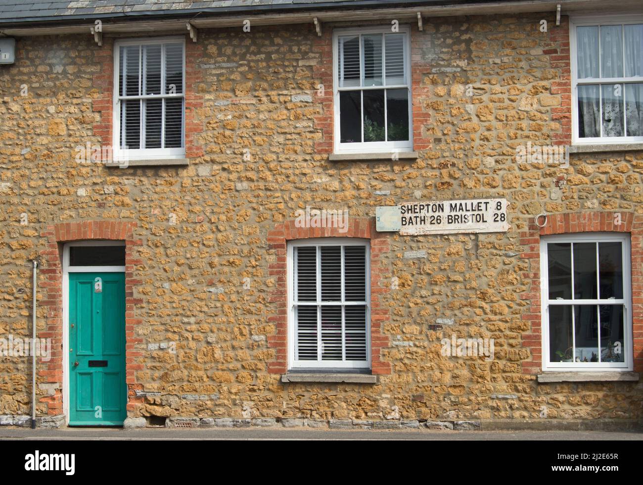 House with distance markers, Castle Cary, Somerset, England, UK Stock ...