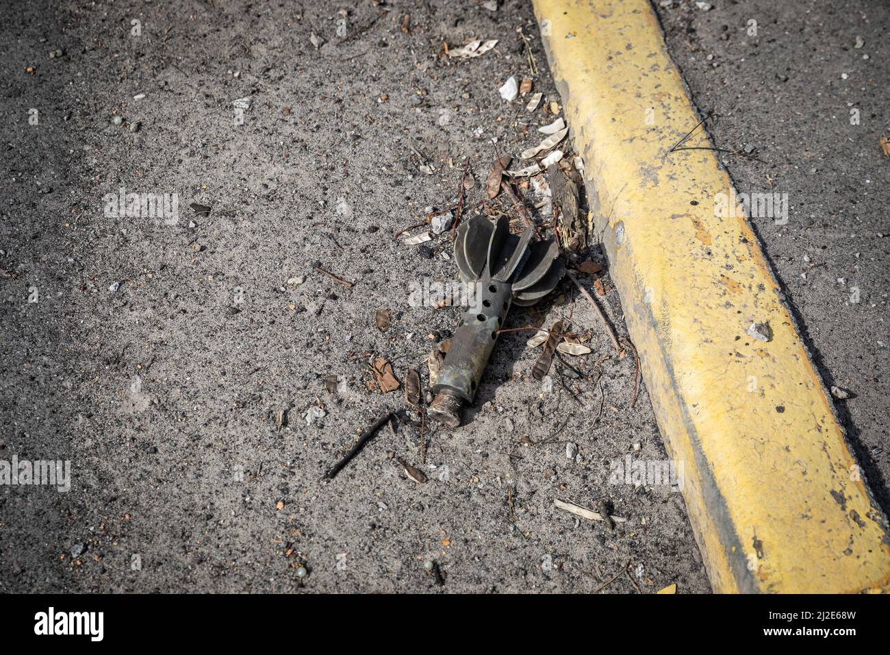 Part of a rocket lying on the street in the city of Irpin, pictured 29. ...