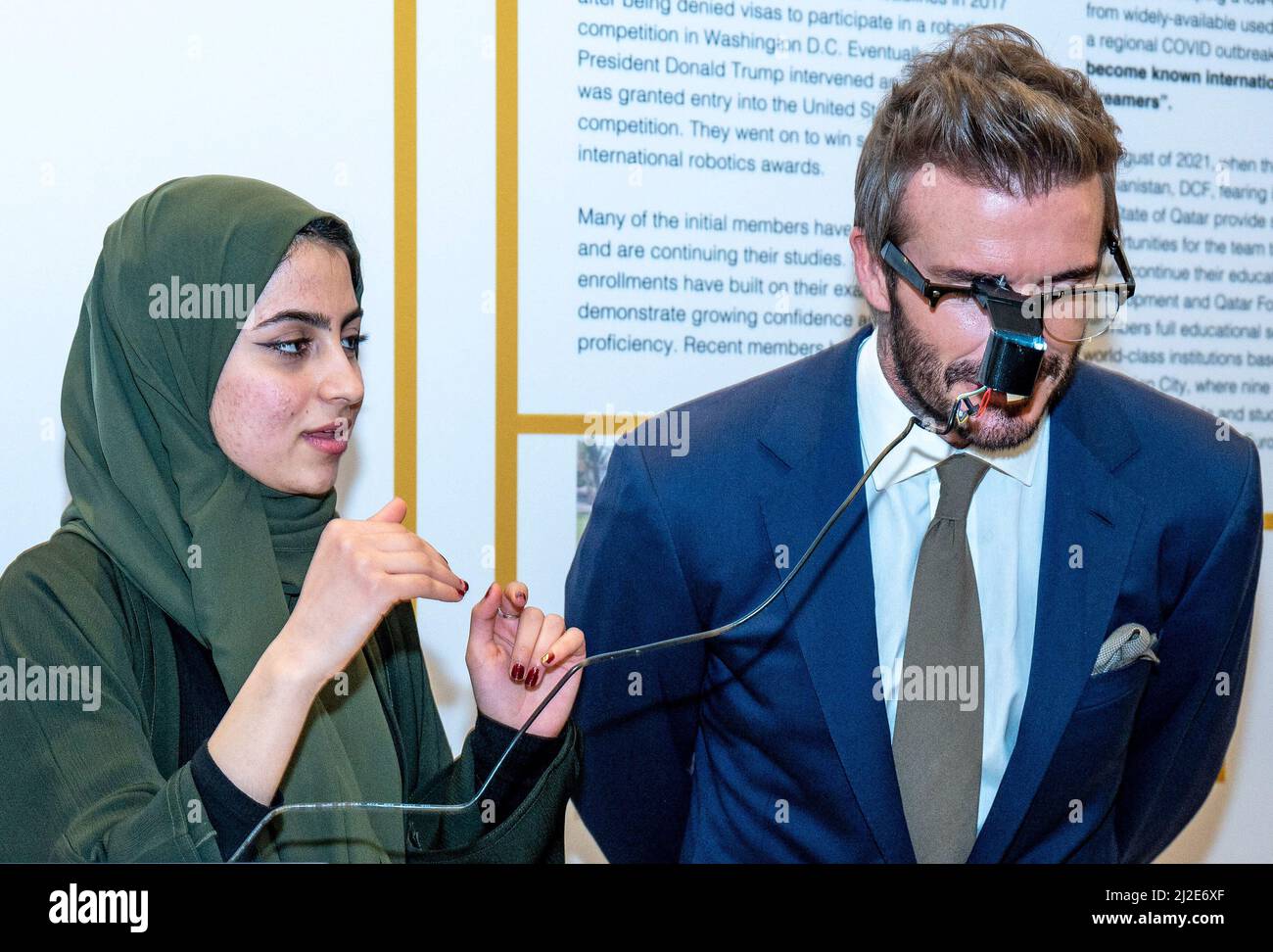 A member of the Afghan Girls Robotic Team demonstrates the use of a ...
