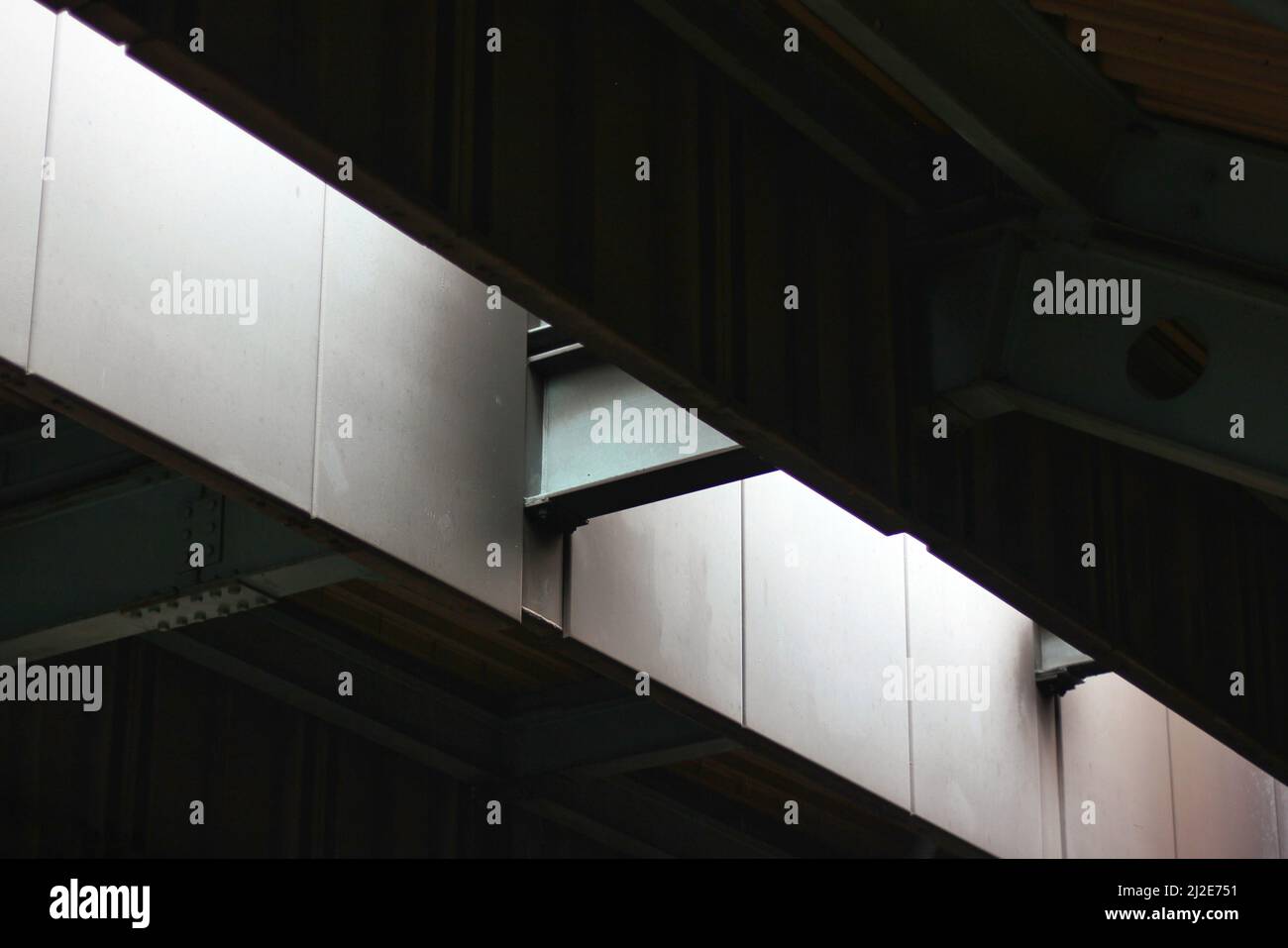 Overhead skylight with a steel connection allowing sunlight into a dark ...