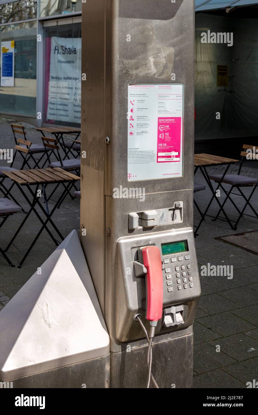 Public pay phone in the pedestrian zone Stock Photo - Alamy