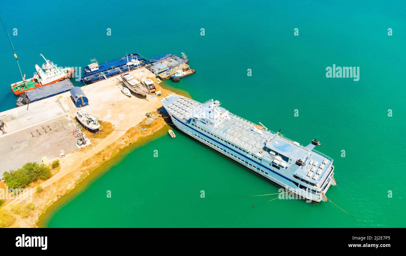 Ferry in the sea port. on the background cranes and containers Stock ...