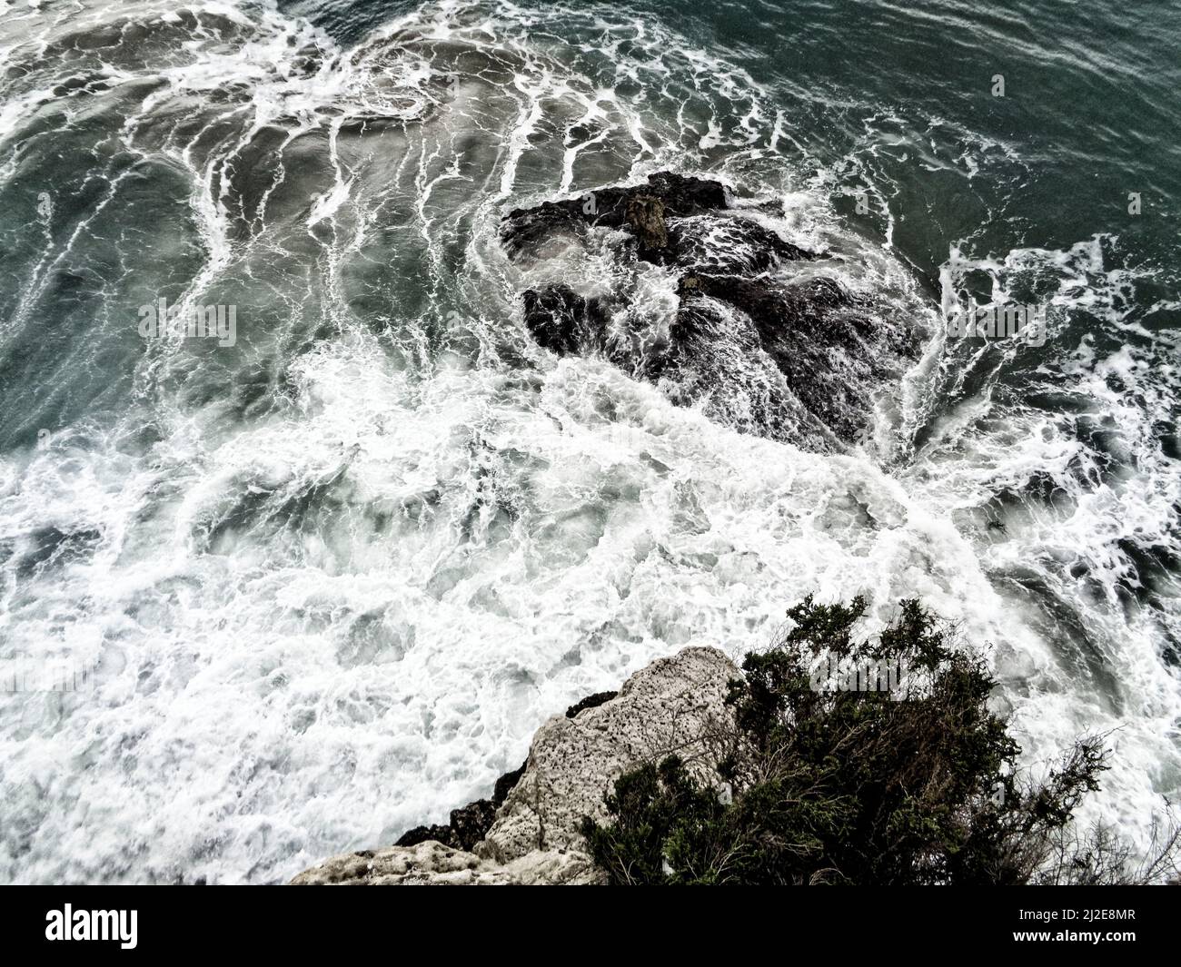 Semi-abstract intimate natural patterns of sea swirling around ...