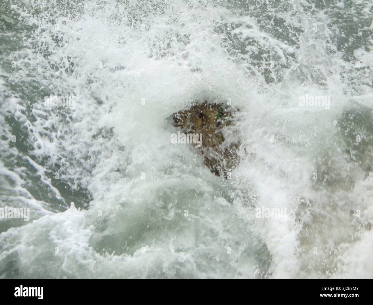 Semi-abstract intimate natural patterns of sea swirling around ...