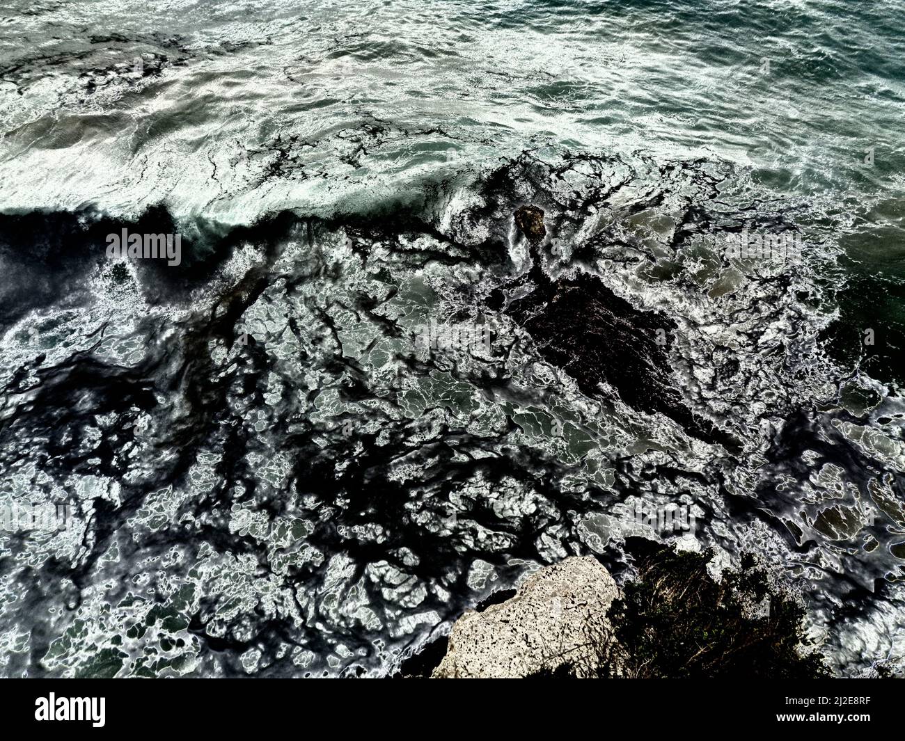Semi-abstract intimate natural patterns of sea swirling around ...